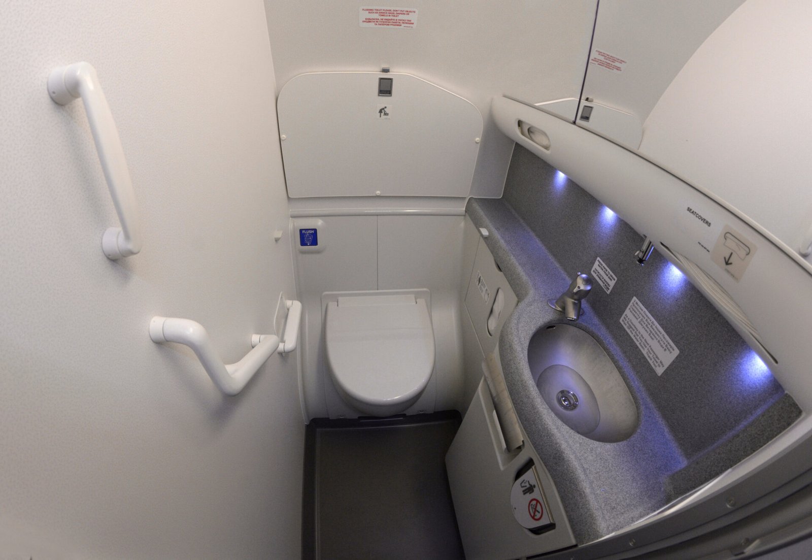 A gross airplane bathroom is the wrong place to do this, experts say ...