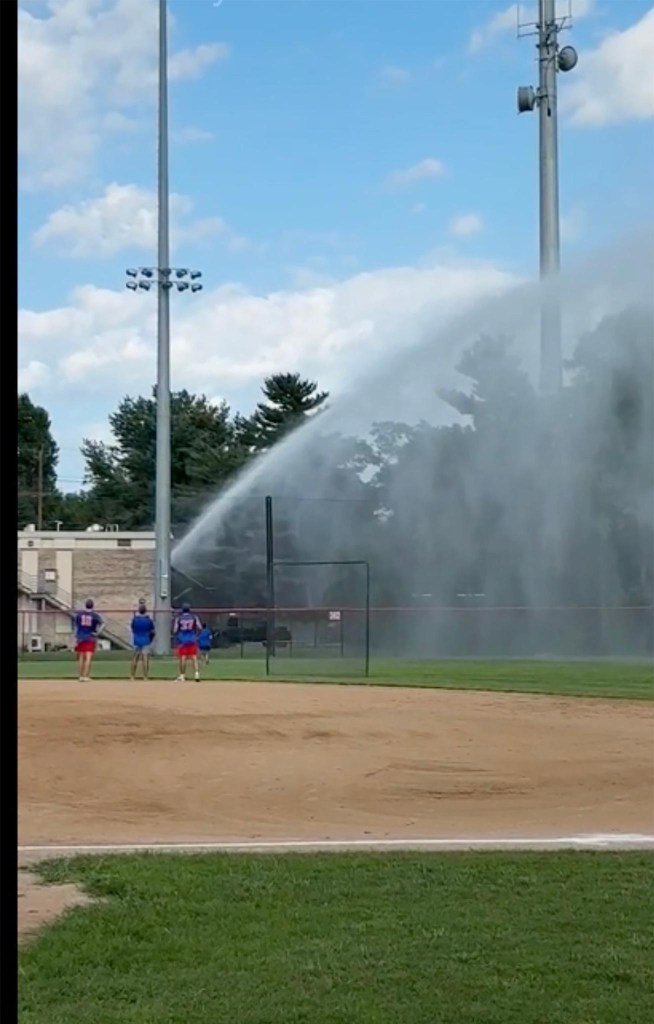 Maryland firefighters charged after flooding baseball field with truck ...