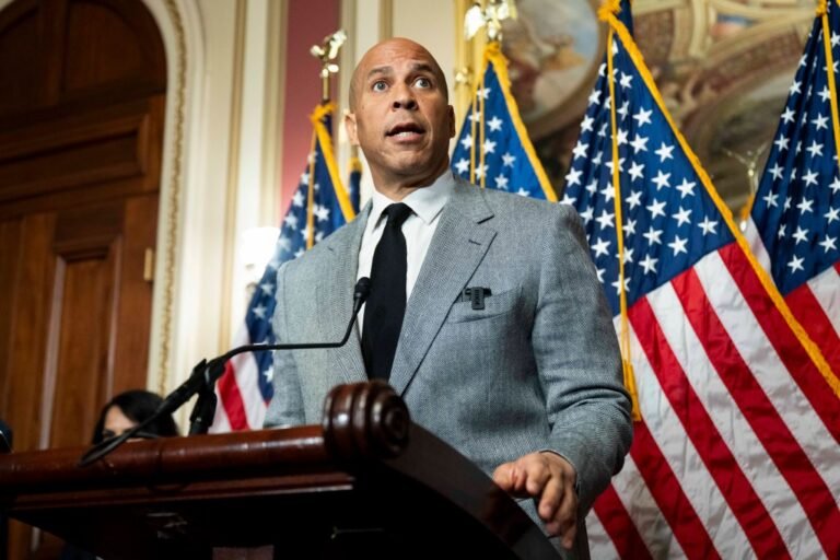 Sen. Cory Booker lights candles on Hanukkah at home for the first time ...